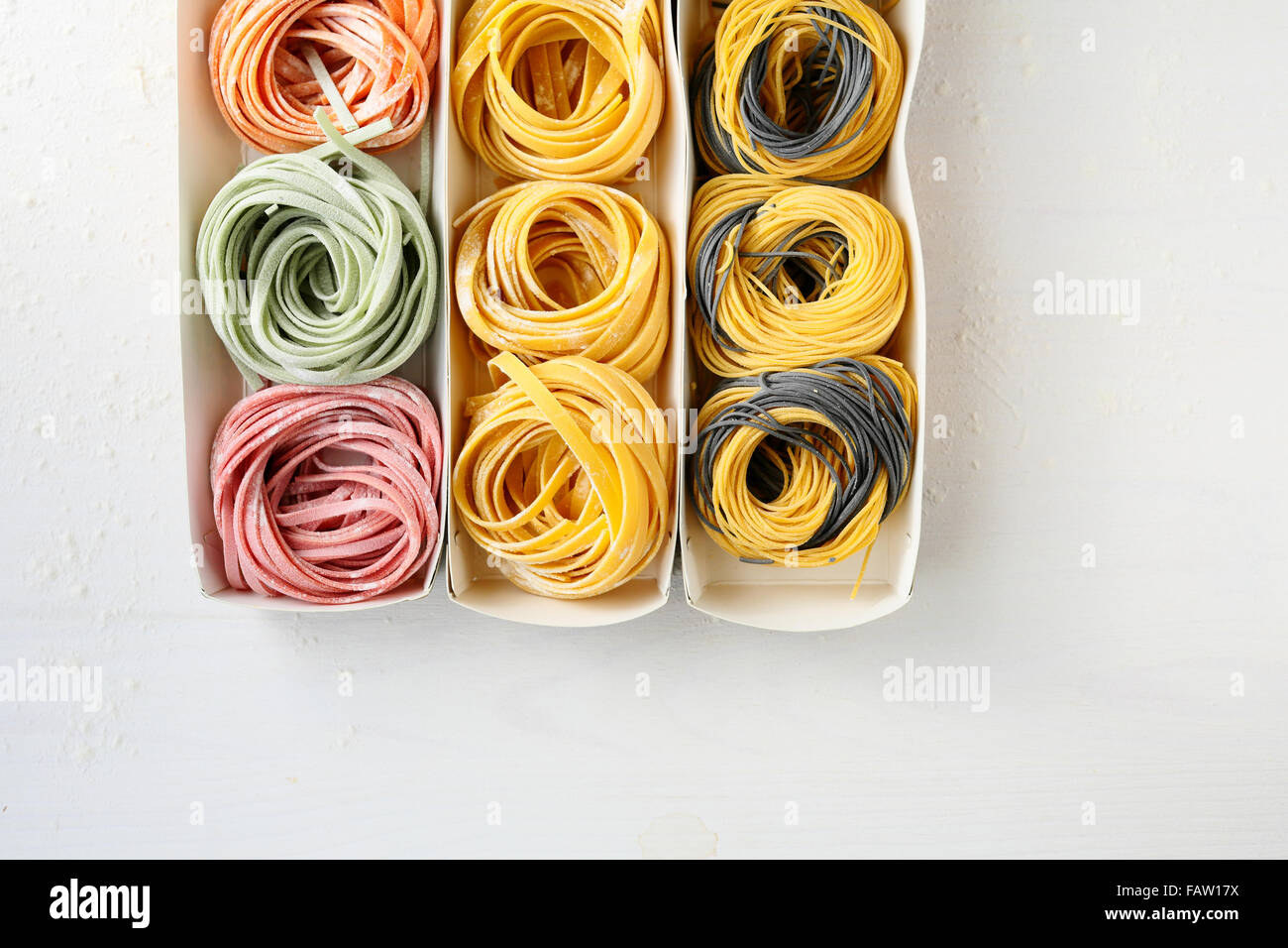 color pasta in box, food top view Stock Photo - Alamy