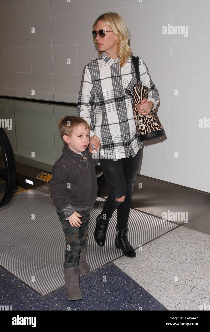 January Jones arrives at Los Angeles International Airport with her son ...