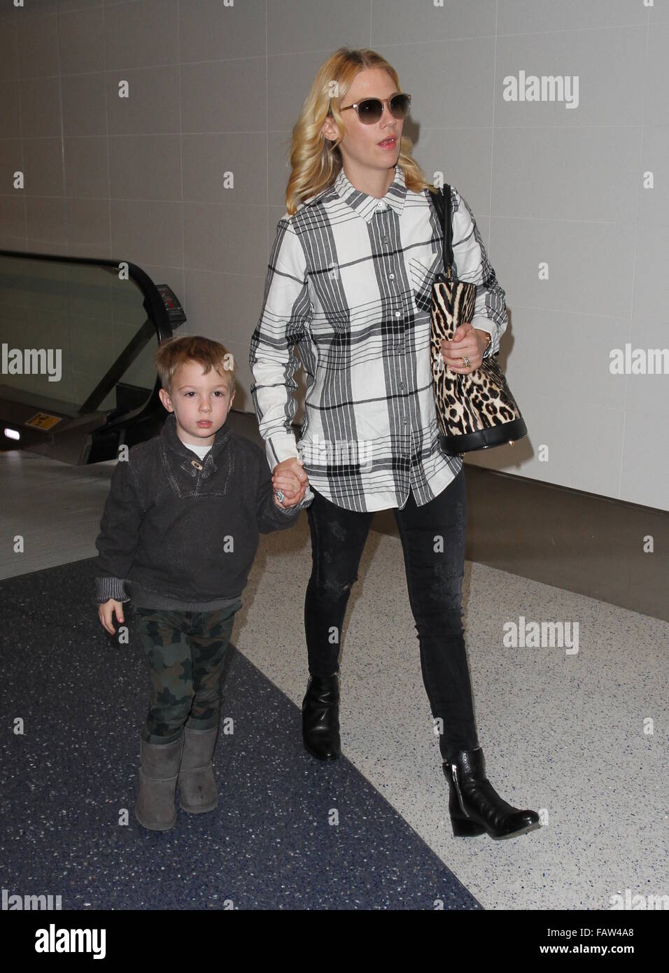January Jones arrives at Los Angeles International Airport with her son ...