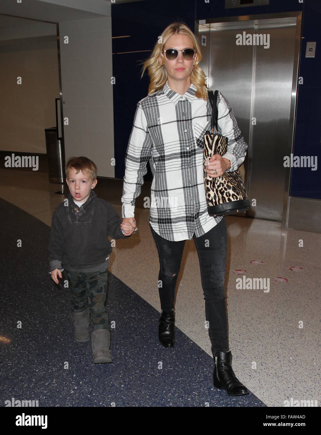 January Jones arrives at Los Angeles International Airport with her son ...
