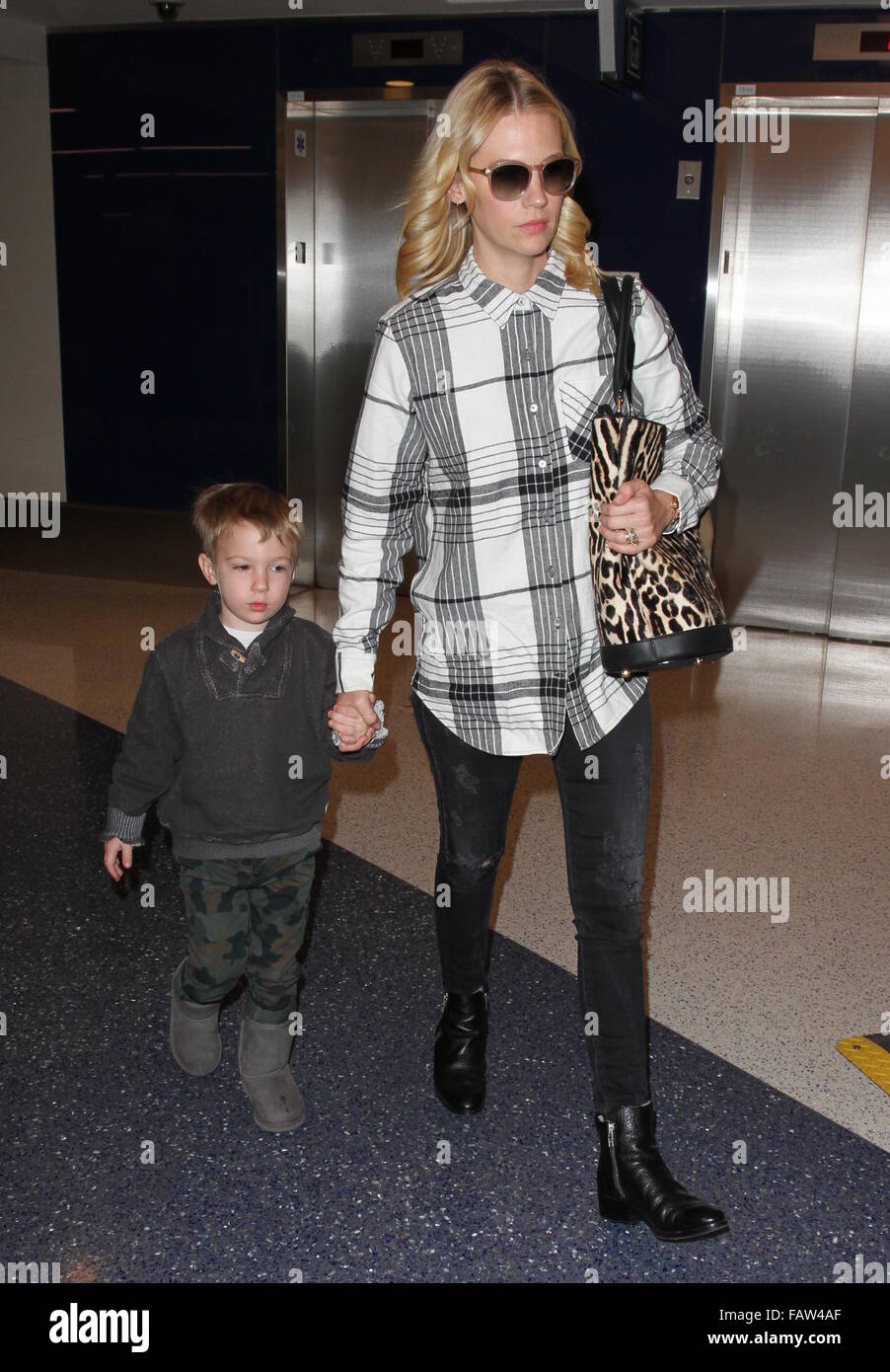 January Jones arrives at Los Angeles International Airport with her son ...