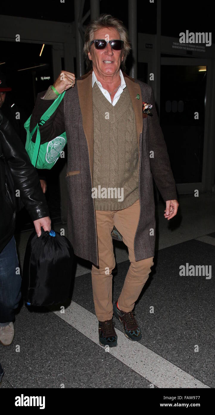 Rod Stewart departs on a flight from Los Angeles International Airport ...