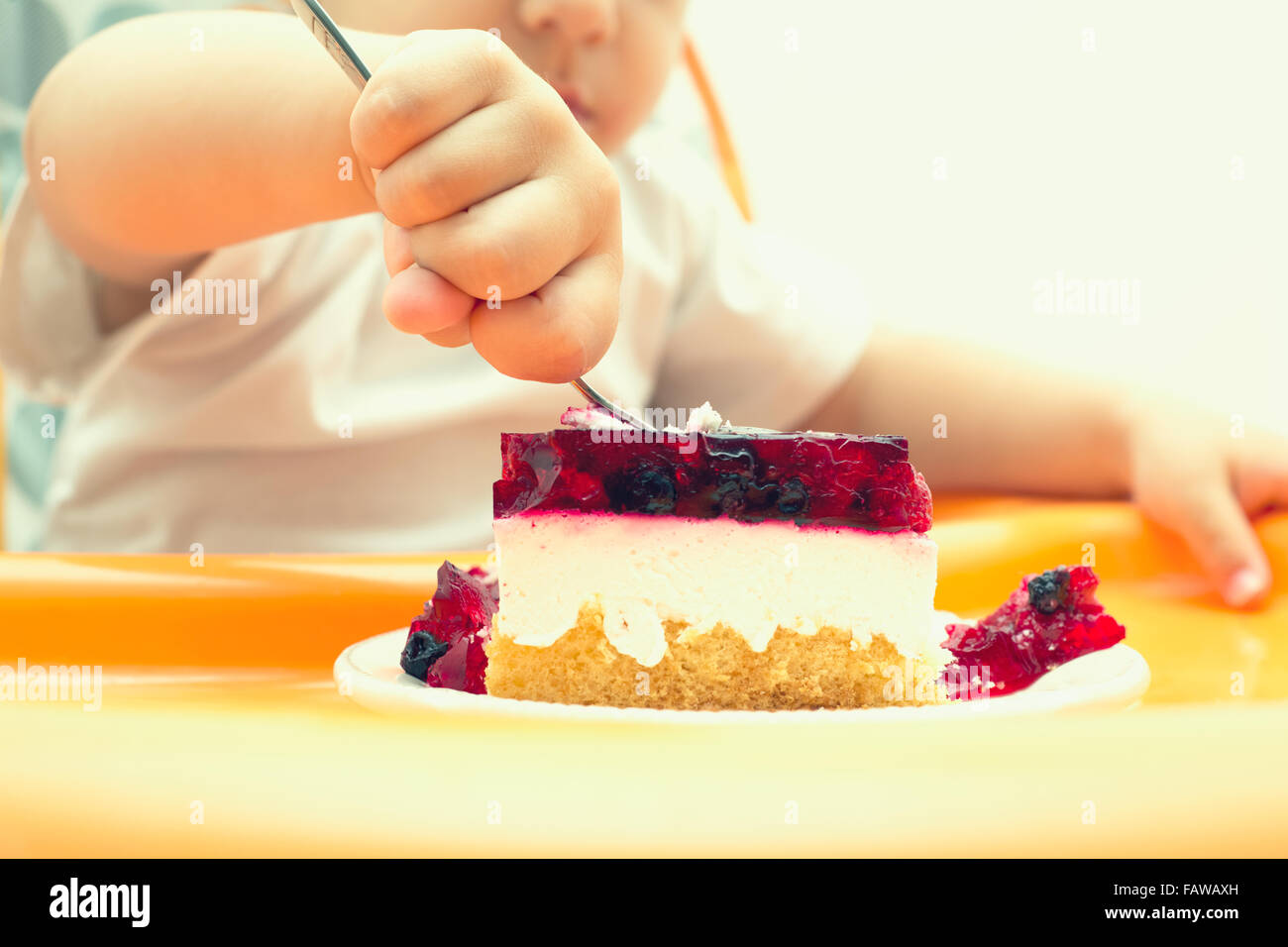 little boy eats cake Stock Photo - Alamy