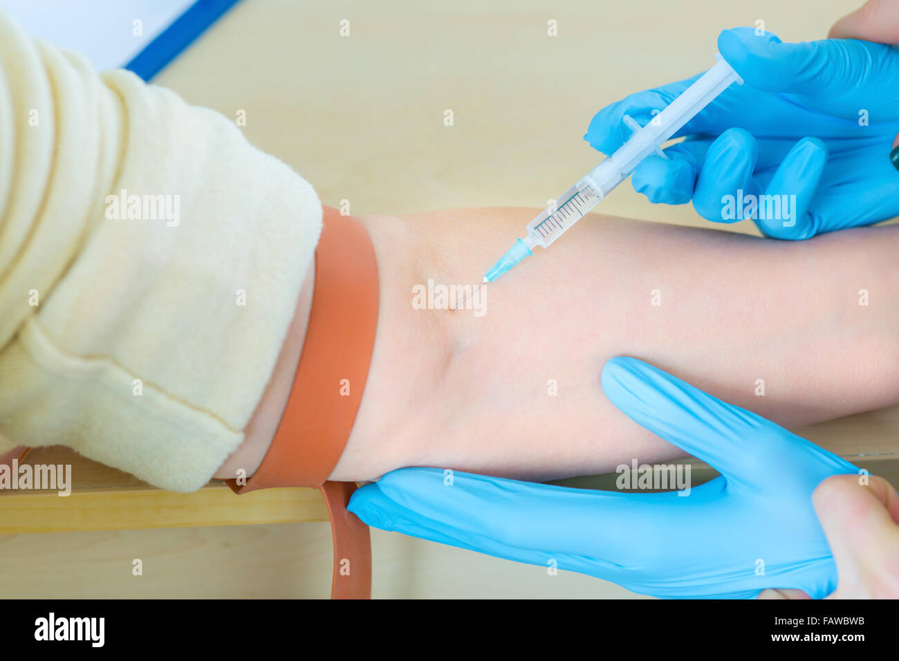 Professional nurse making injection Stock Photo - Alamy