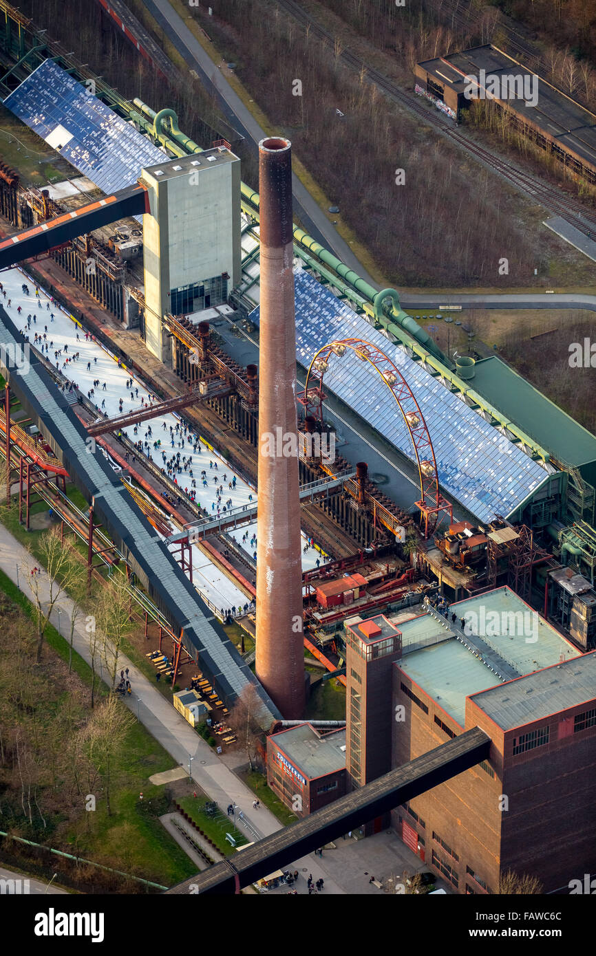 Skating rink in the coking plant Zollverein colliery with sun wheel at ...