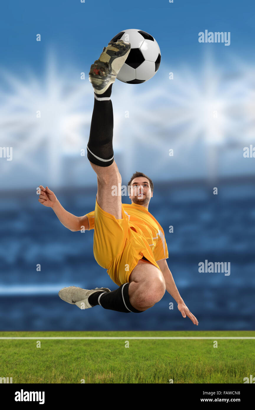 Soccer player performing a bicycle kick hi-res stock photography and ...
