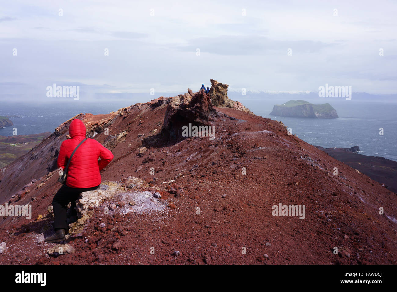 Hikers on top of Eldfell volcano, Island Heimaey, Westman Islands ...