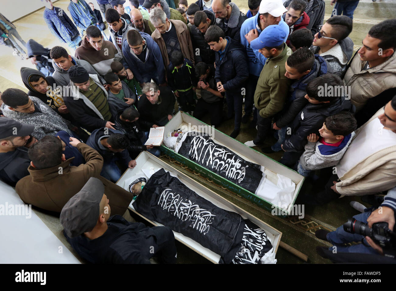 Ramallah, West Bank, Palestinian Territory. 5th Jan, 2016. Mourners ...