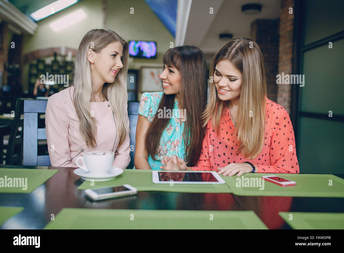 Girls with phones Stock Photo - Alamy