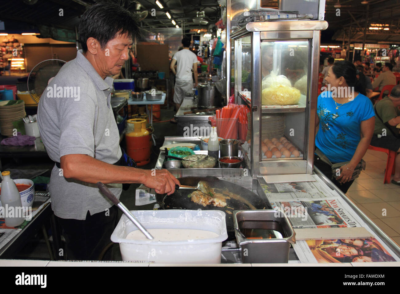 hawker stall selling satay,a man cokking local dish, Penang, Malaysia ...