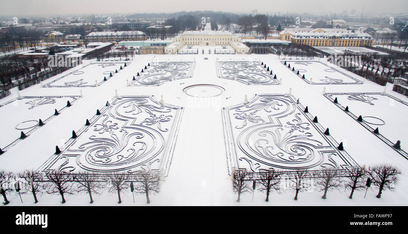 The snow-covered large garden of the Herrenhausen Gardens and Schloss ...