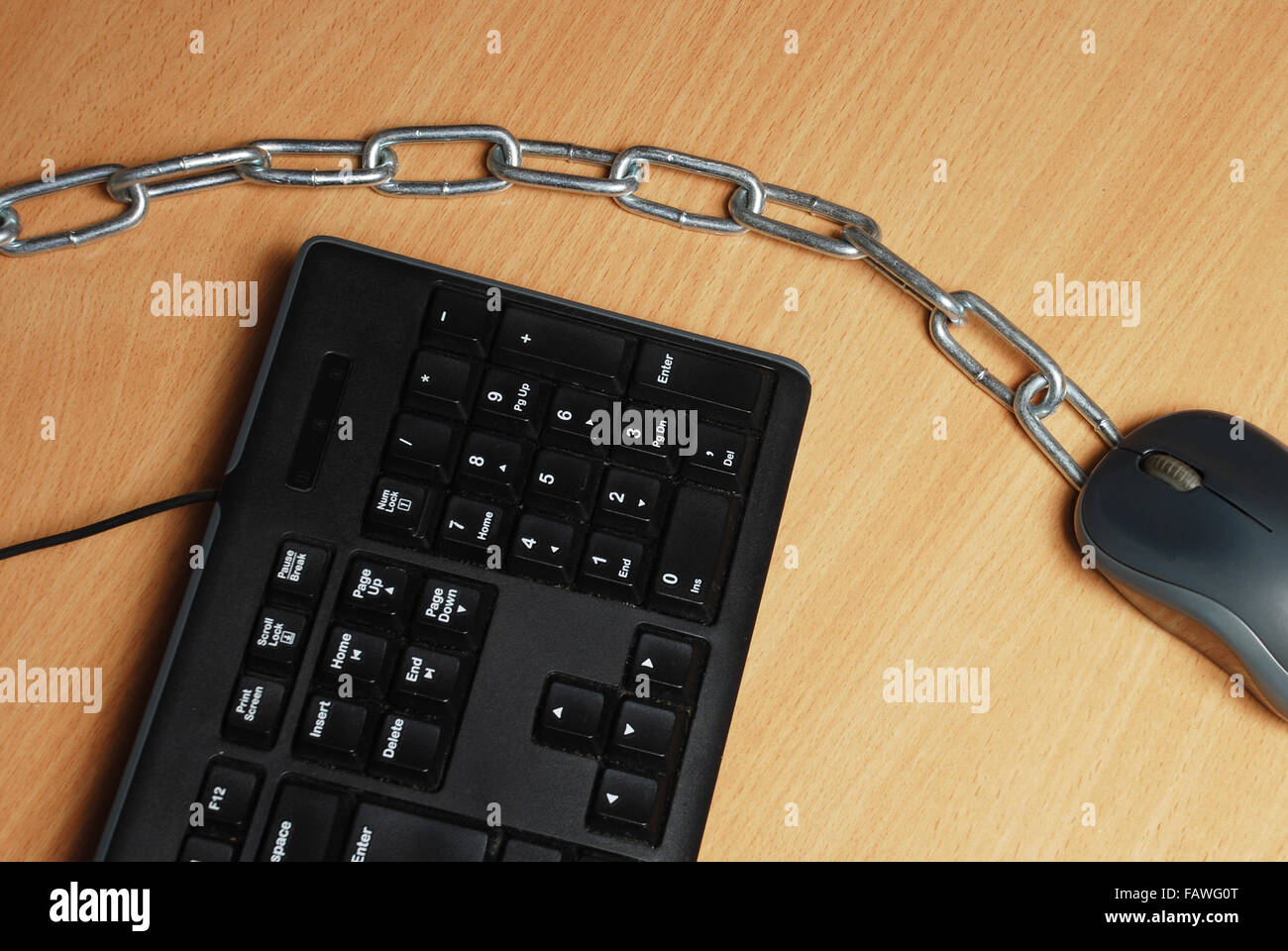 Chained to the desk hi-res stock photography and images - Alamy