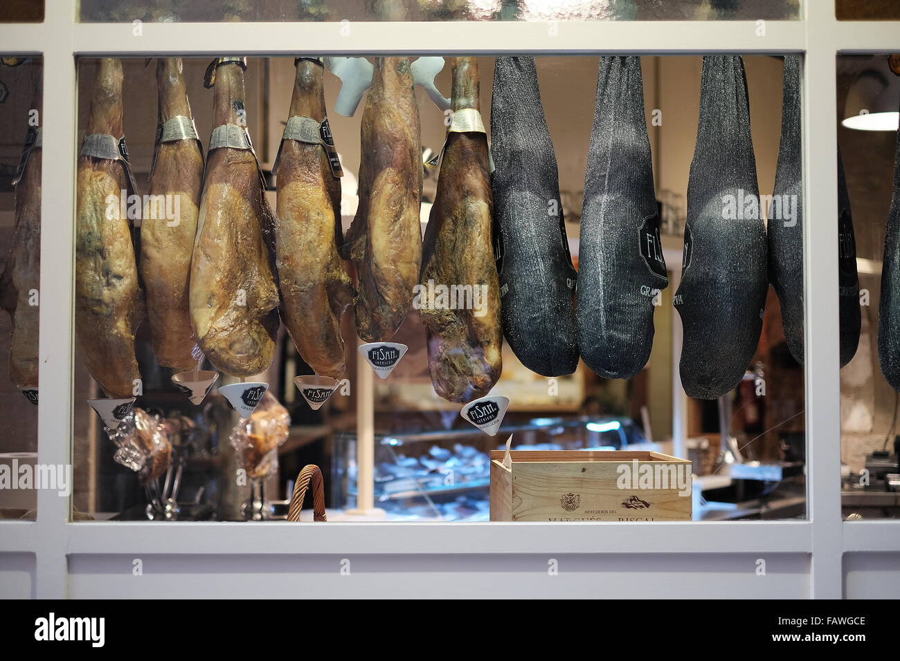 Iberico Fiscan cured pork leg in a shop window. Xarcutiers Stock Photo ...