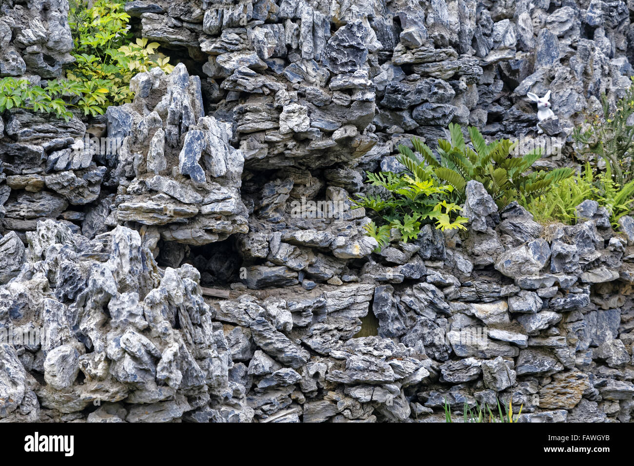 Stone rock boulder grass lawn hi-res stock photography and images - Alamy