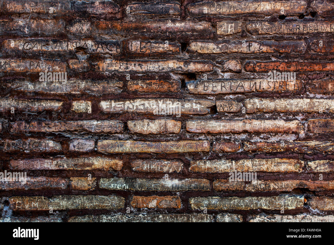 Names defacing a stone wall, Colosseum; Rome, Italy Stock Photo - Alamy