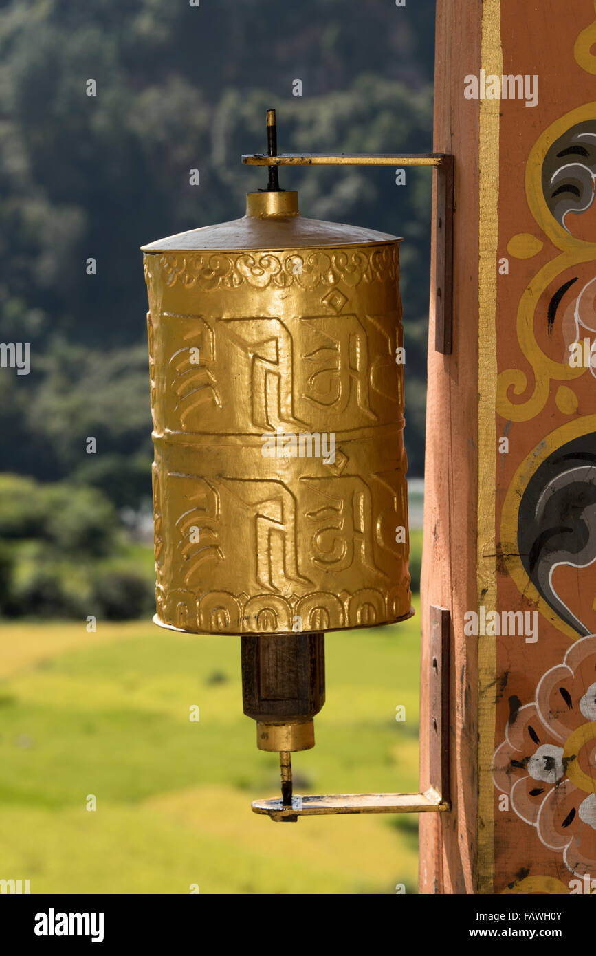 Gold prayer wheel; Bhutan Stock Photo - Alamy