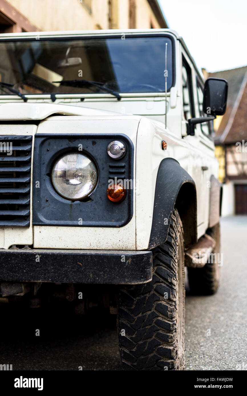 Retro dirty off-road car on the street, 4x4 Stock Photo - Alamy
