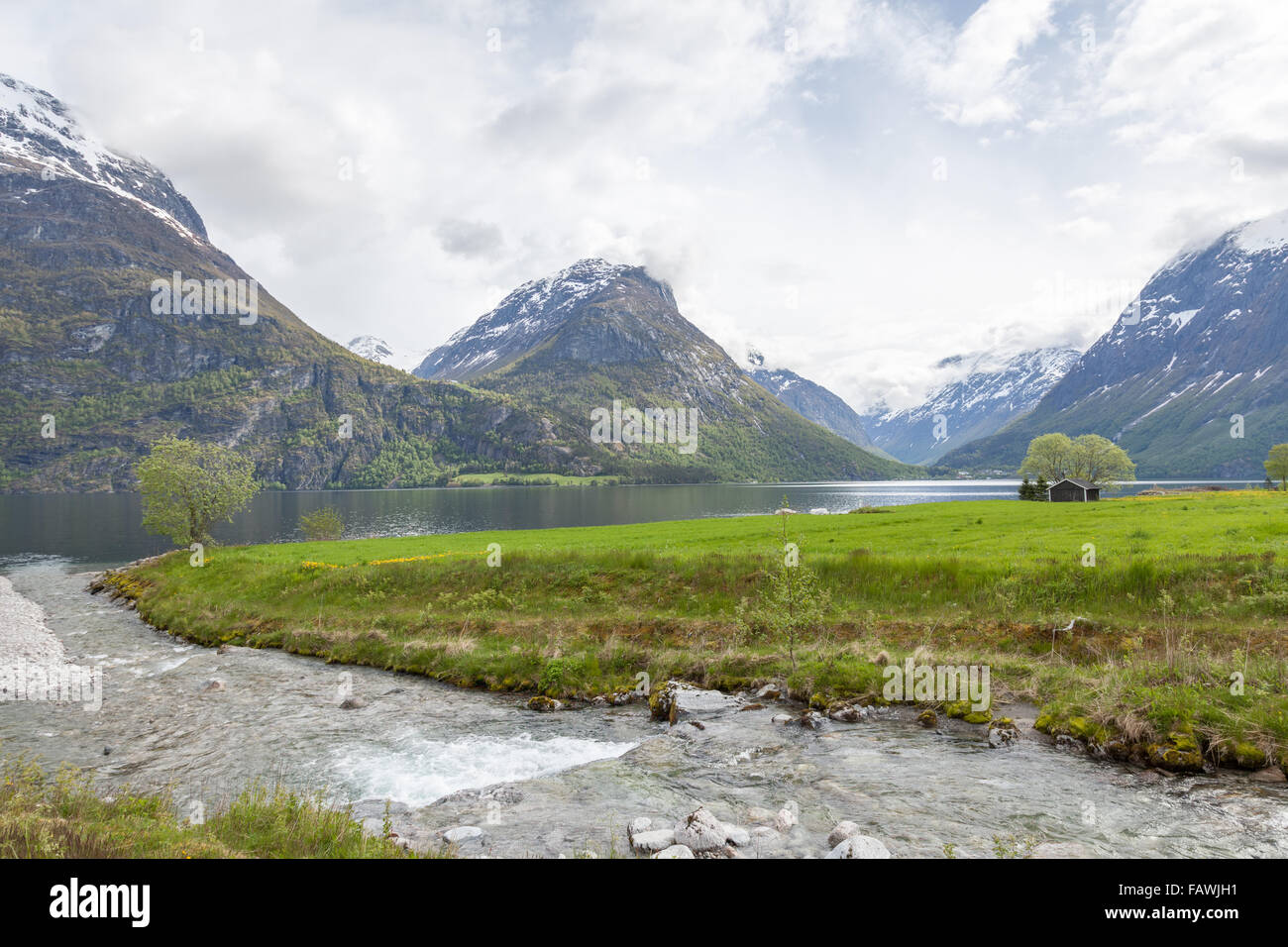 norwegian fjord with mountains and water Stock Photo - Alamy
