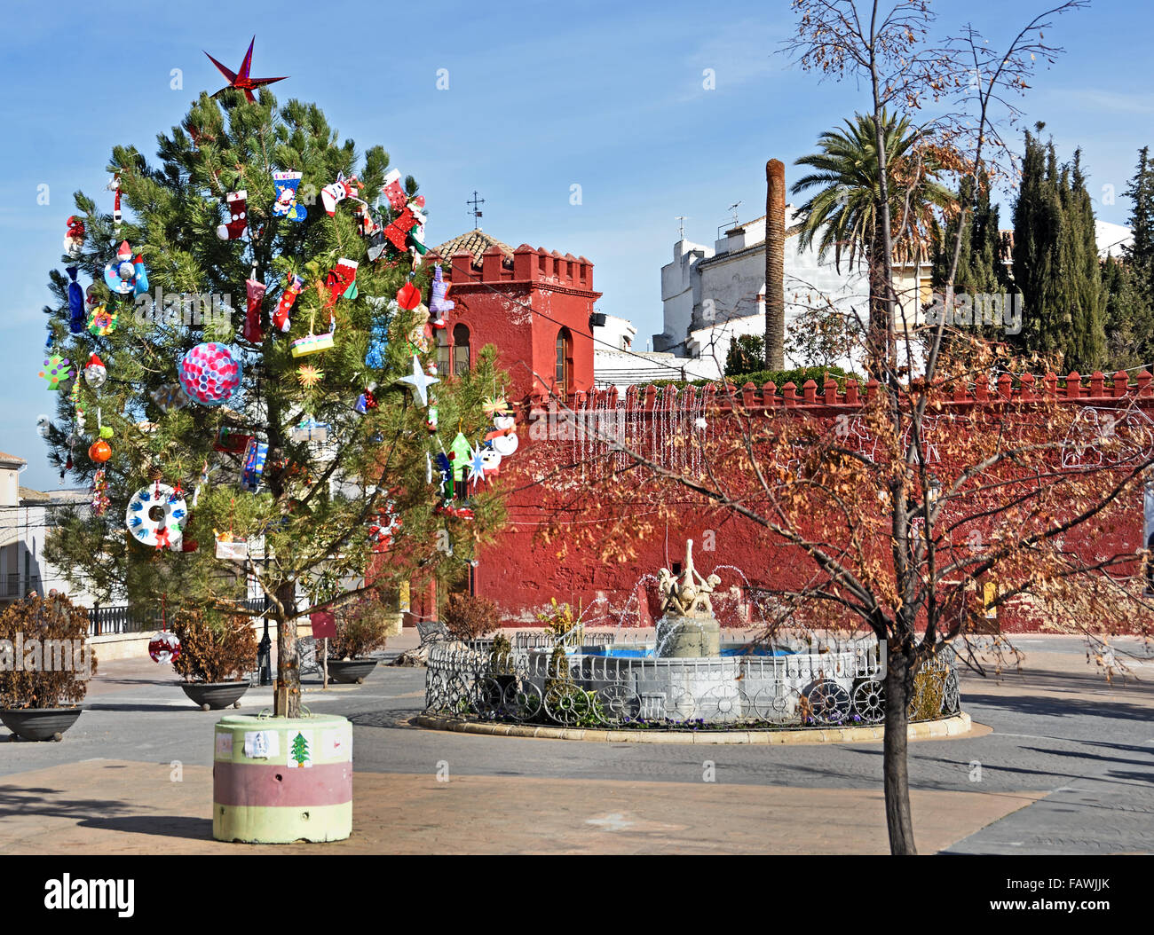 Moorish red castle walls in Plaza de la Constitucion Alhama de Granada ...