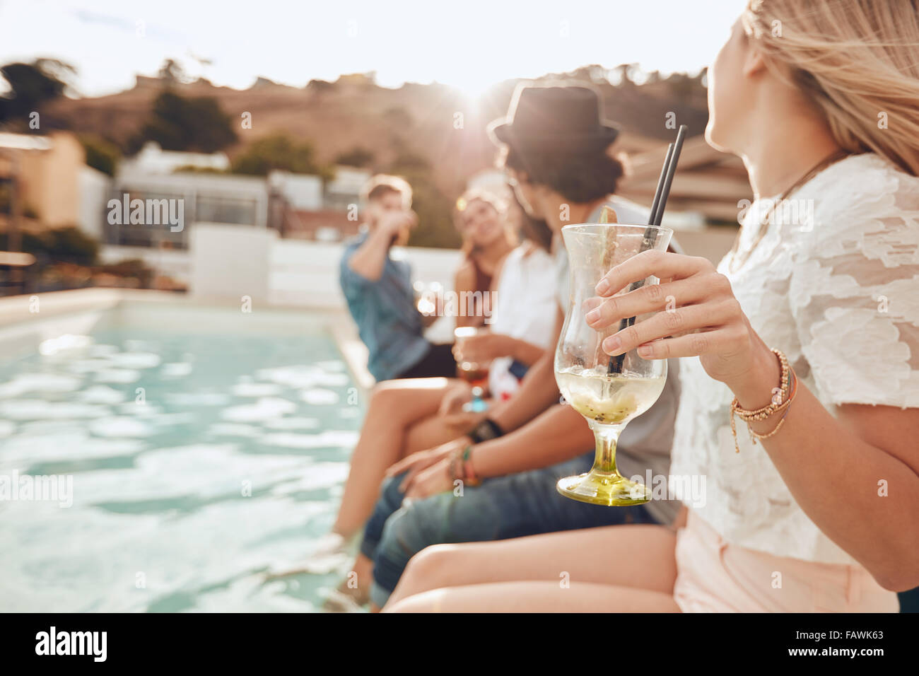 Hand holding cocktail swimming pool hi-res stock photography and images ...