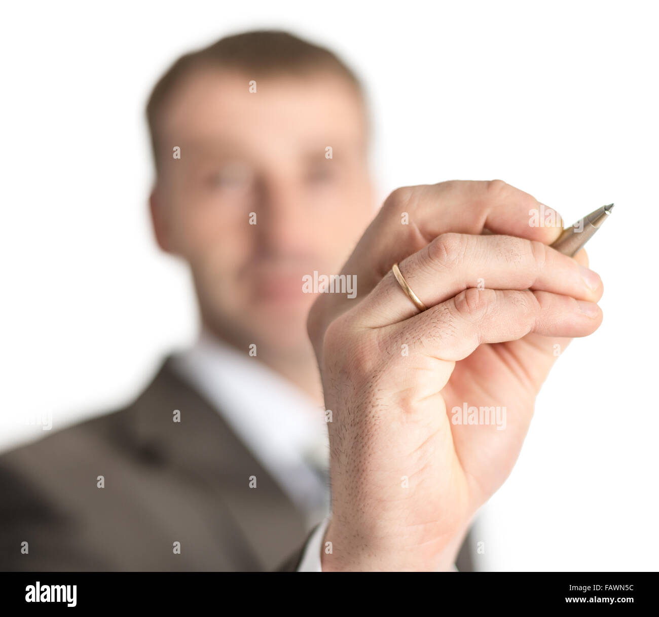 Businessman writing on screen Stock Photo - Alamy
