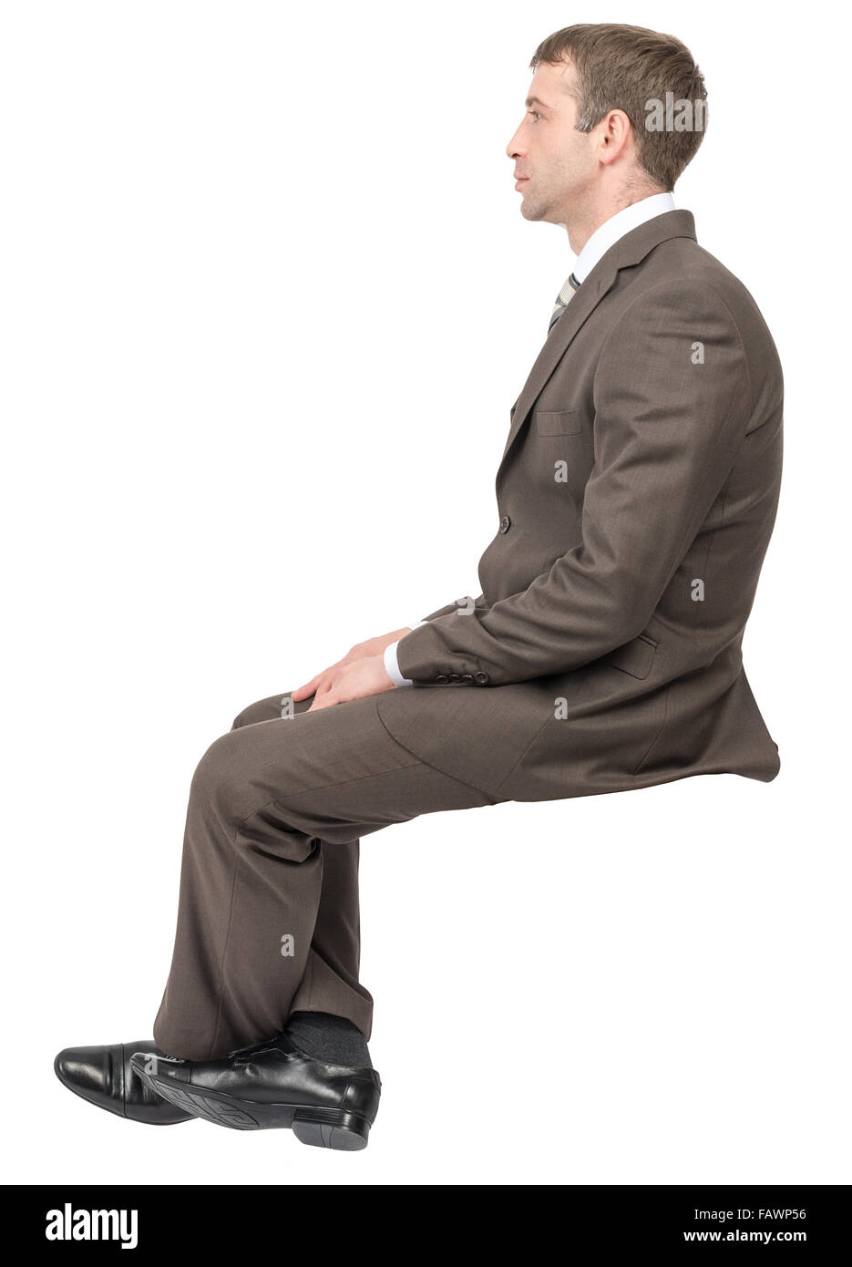 Man sitting side view suit Cut Out Stock Images & Pictures - Alamy