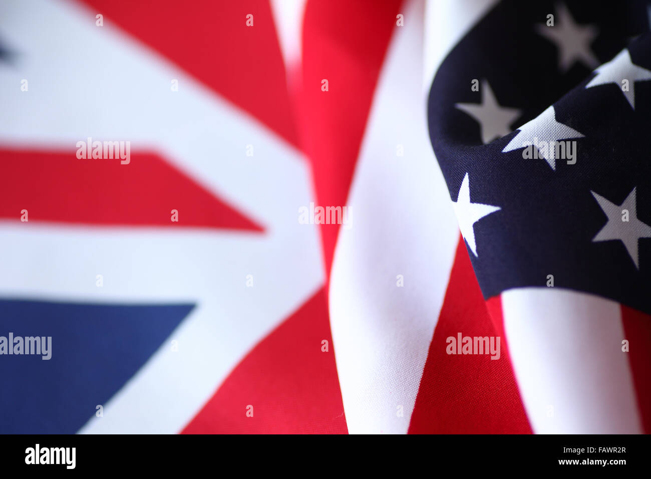 Draped United States flag next to British flag Stock Photo - Alamy
