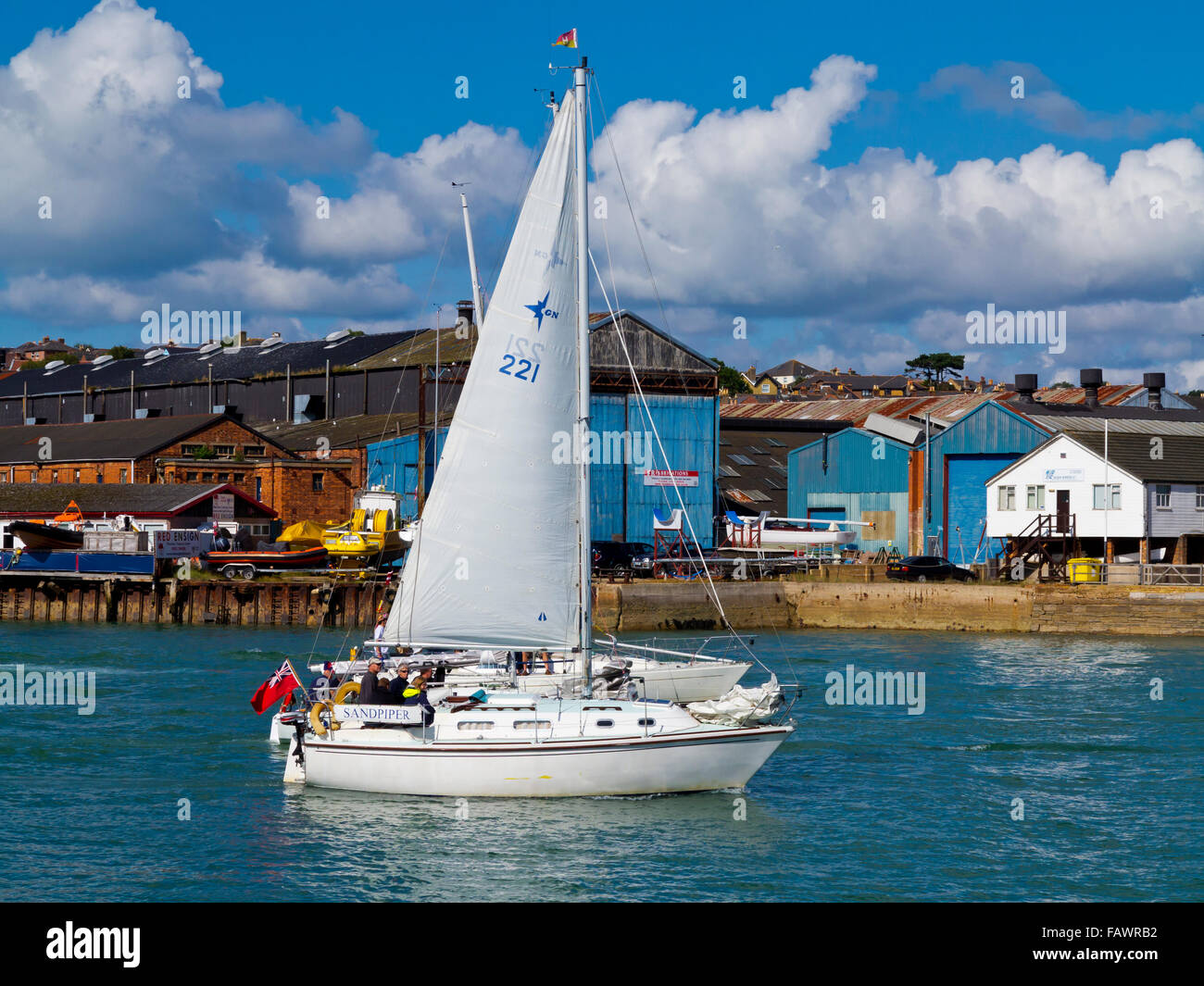 Sailing boat on the River Medina at Cowes on the Isle of Wight southern ...