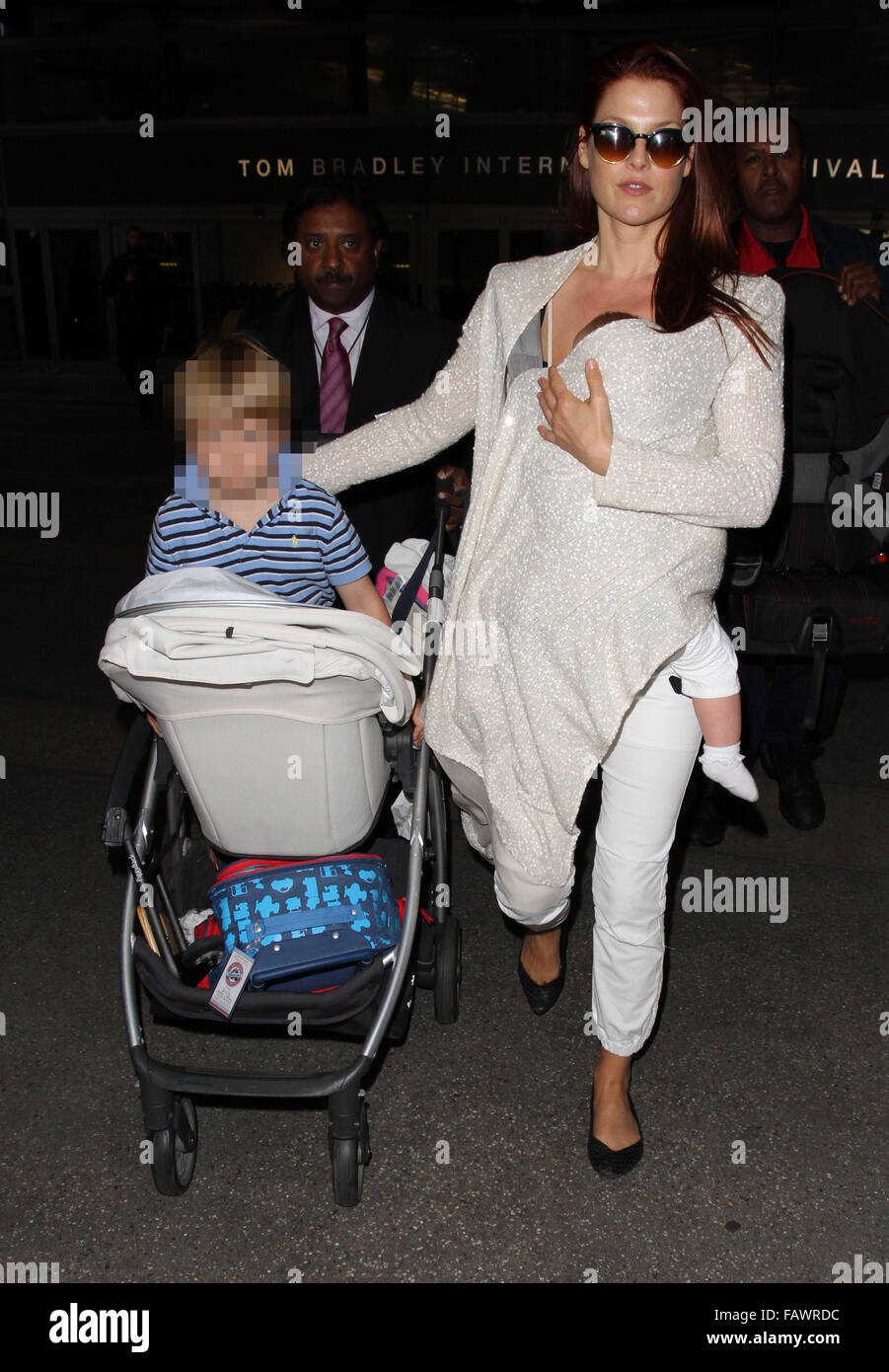 Ali Larter arrives on a flight to Los Angeles International Airport ...