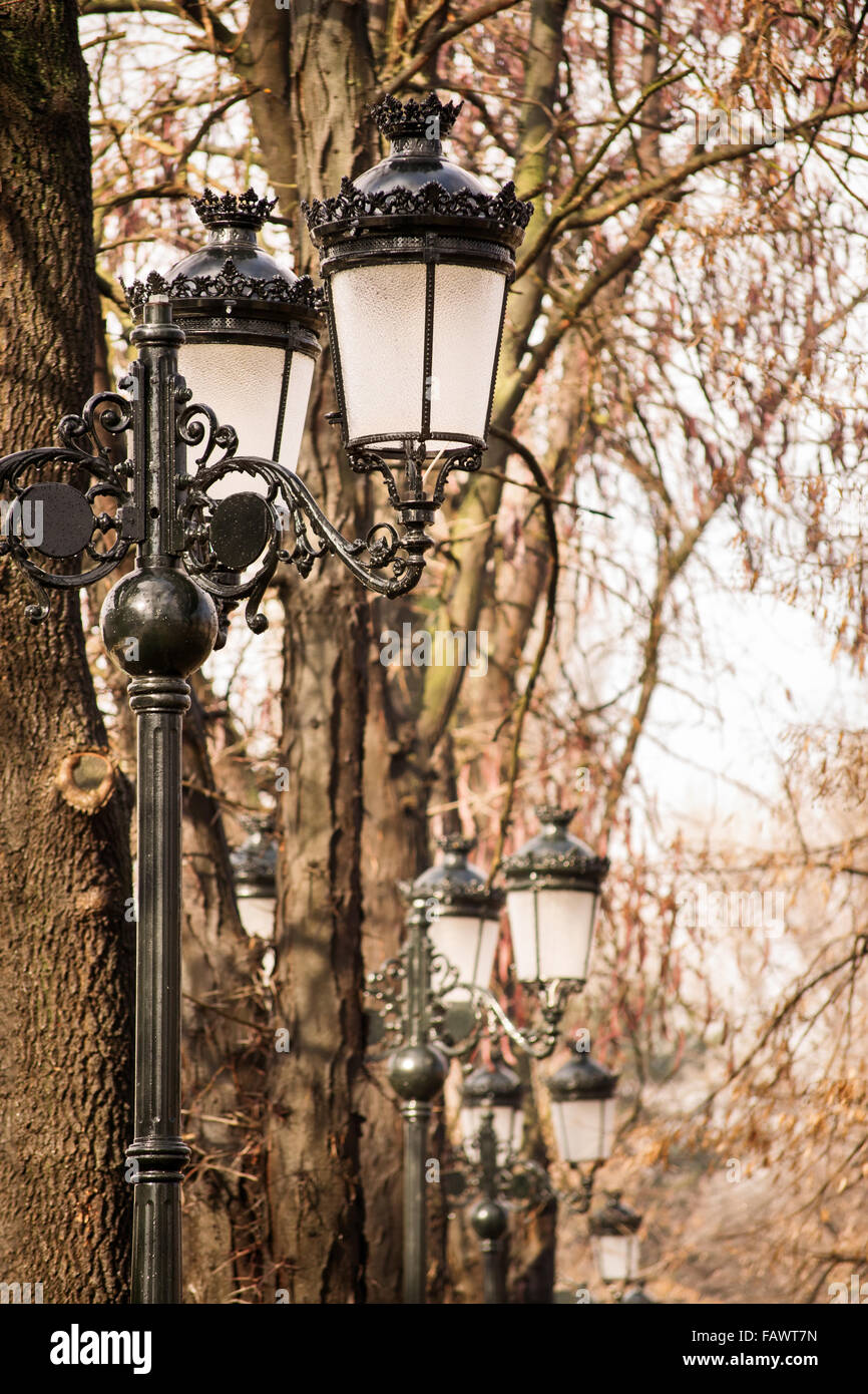 Close up shot of an array of old fashioned lantern street lights in a ...