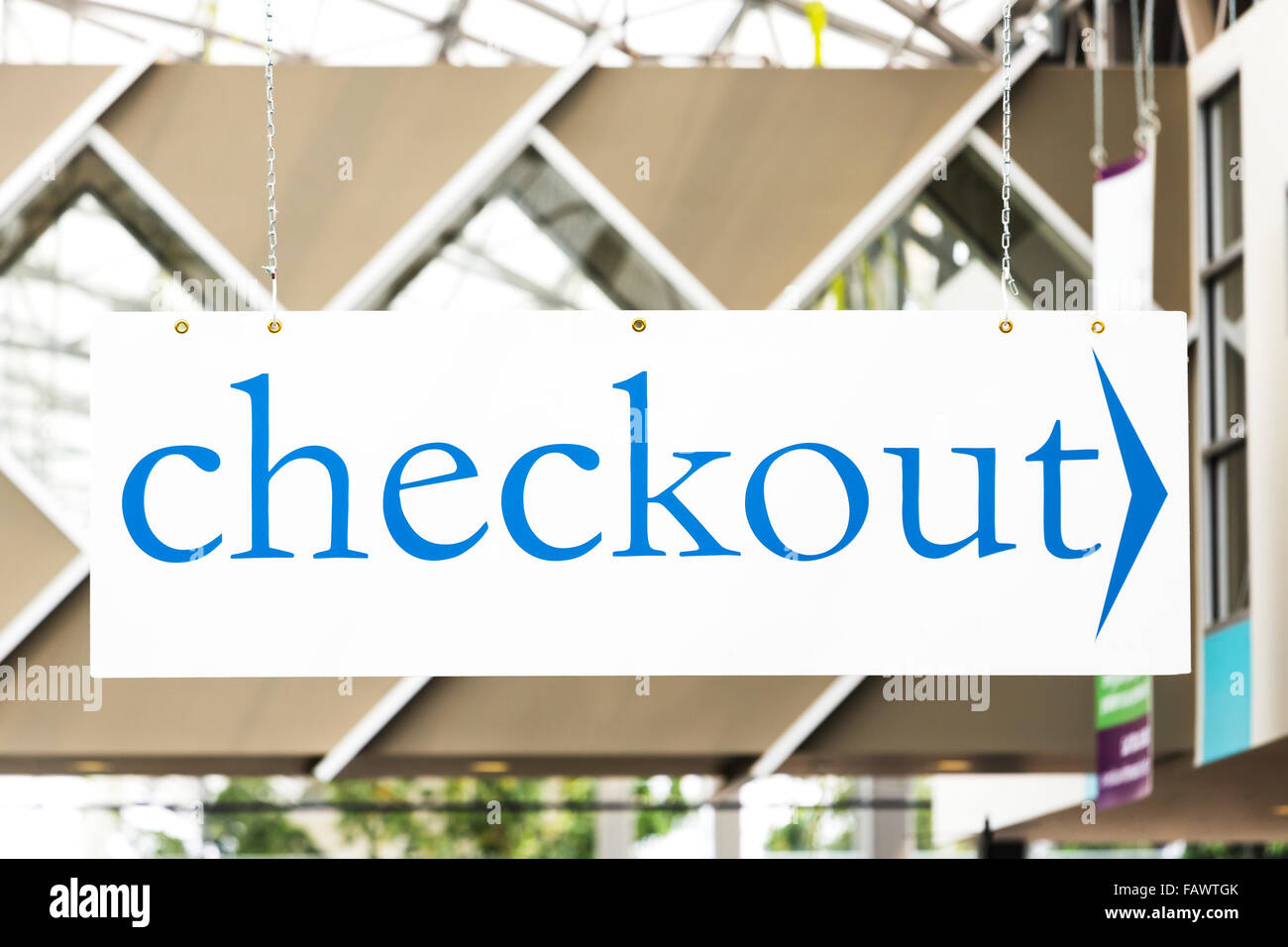 Checkout sign at a retail garden centre in a shopping complex; St ...