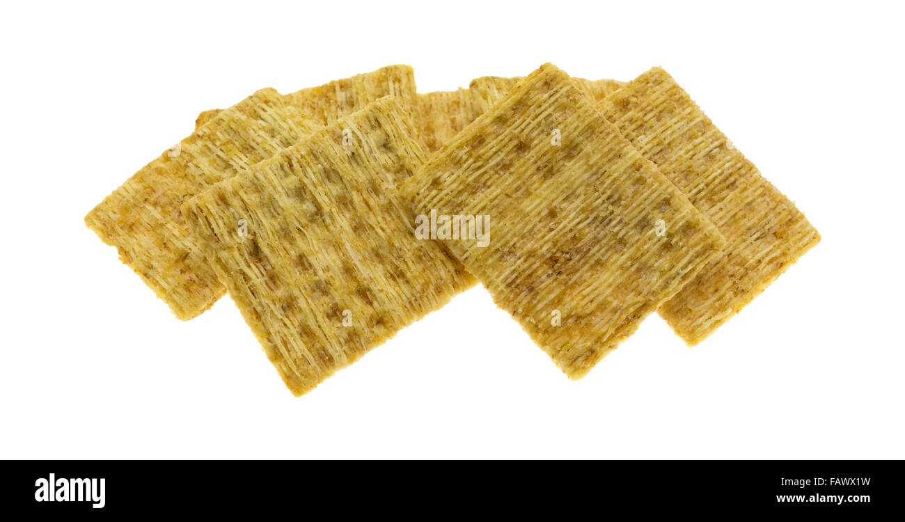 A serving of a whole grain wheat crackers isolated on a white ...