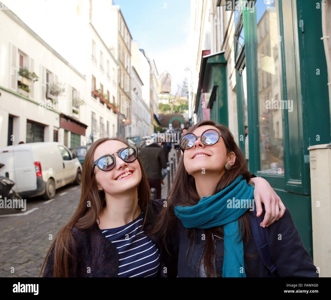 Happy beautiful student girls in Paris on the street Stock Photo - Alamy