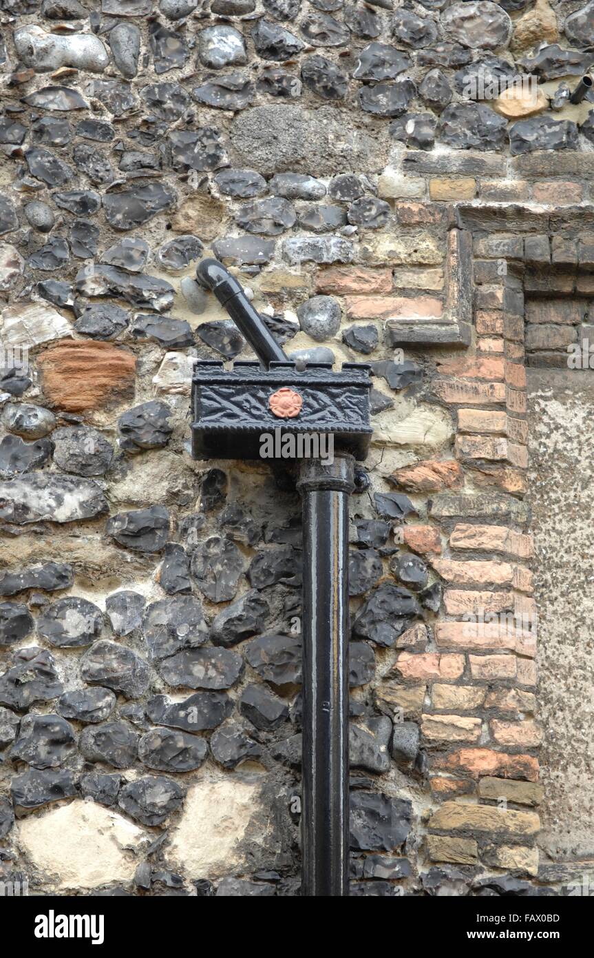 Brick wall with a window that has been blocked up with bricks, with a ...