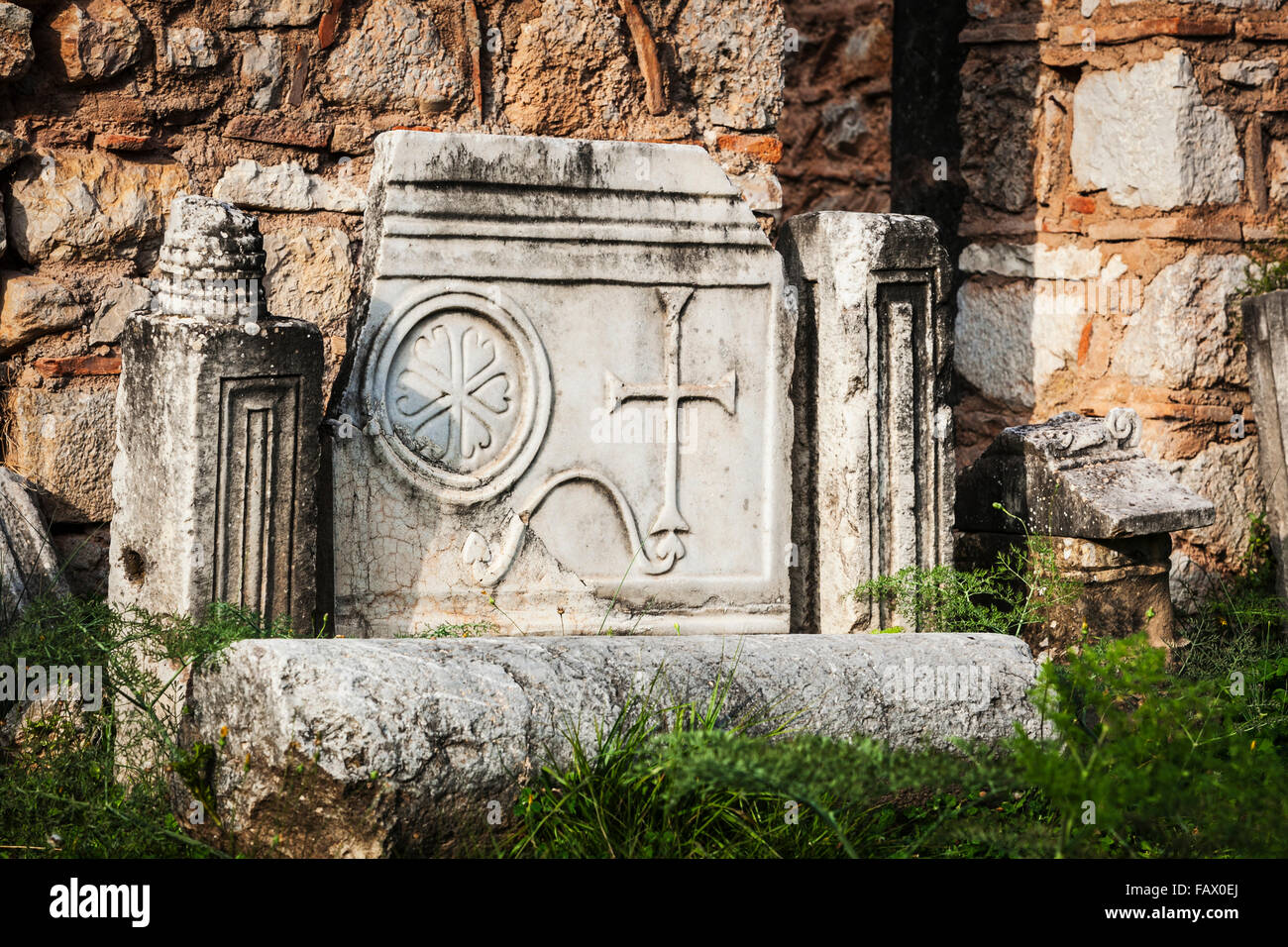 Cracked stone structure with a cross; Delphi, Greece Stock Photo - Alamy