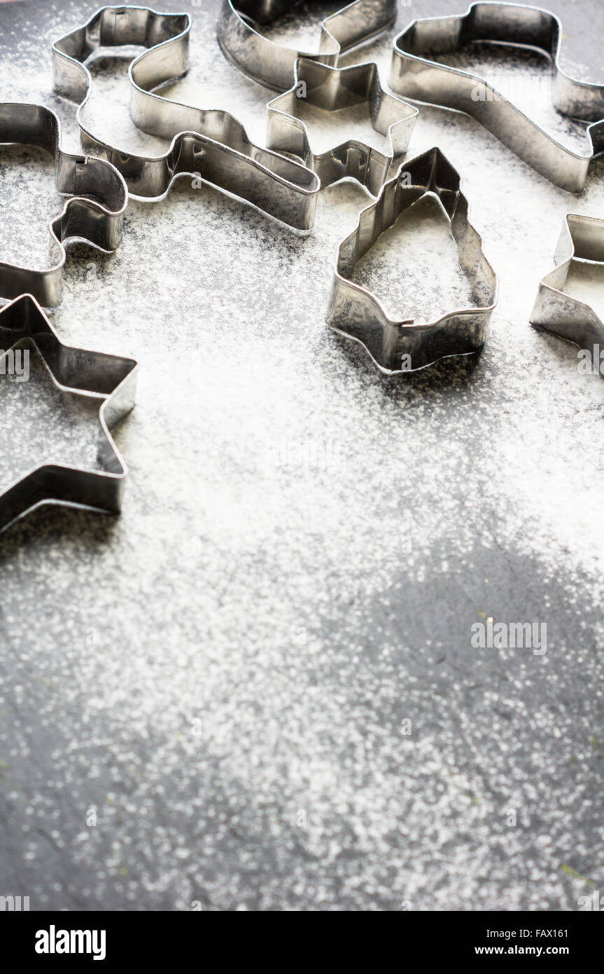 Holiday Cookie Cutters on Rustic black stone background Stock Photo - Alamy