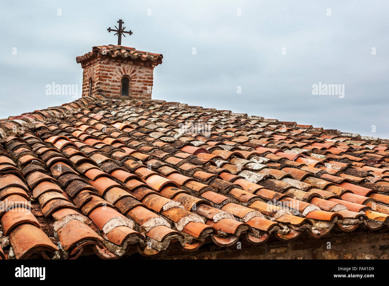 Tiles and cross on roof of Monastery Varlaam; Meteora, Greece Stock ...