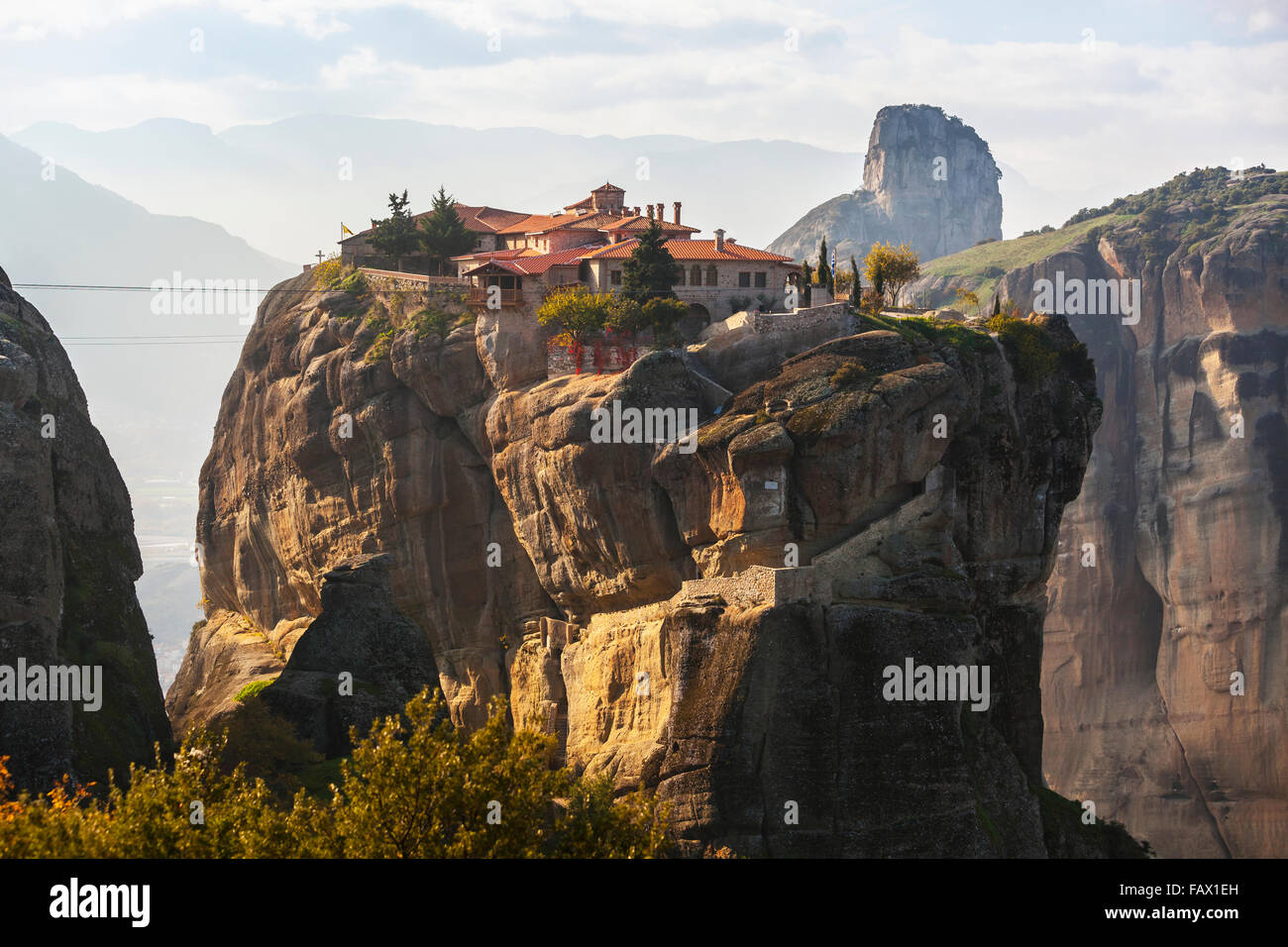 Monastery on the edge of a cliff; Meteora, Greece Stock Photo - Alamy