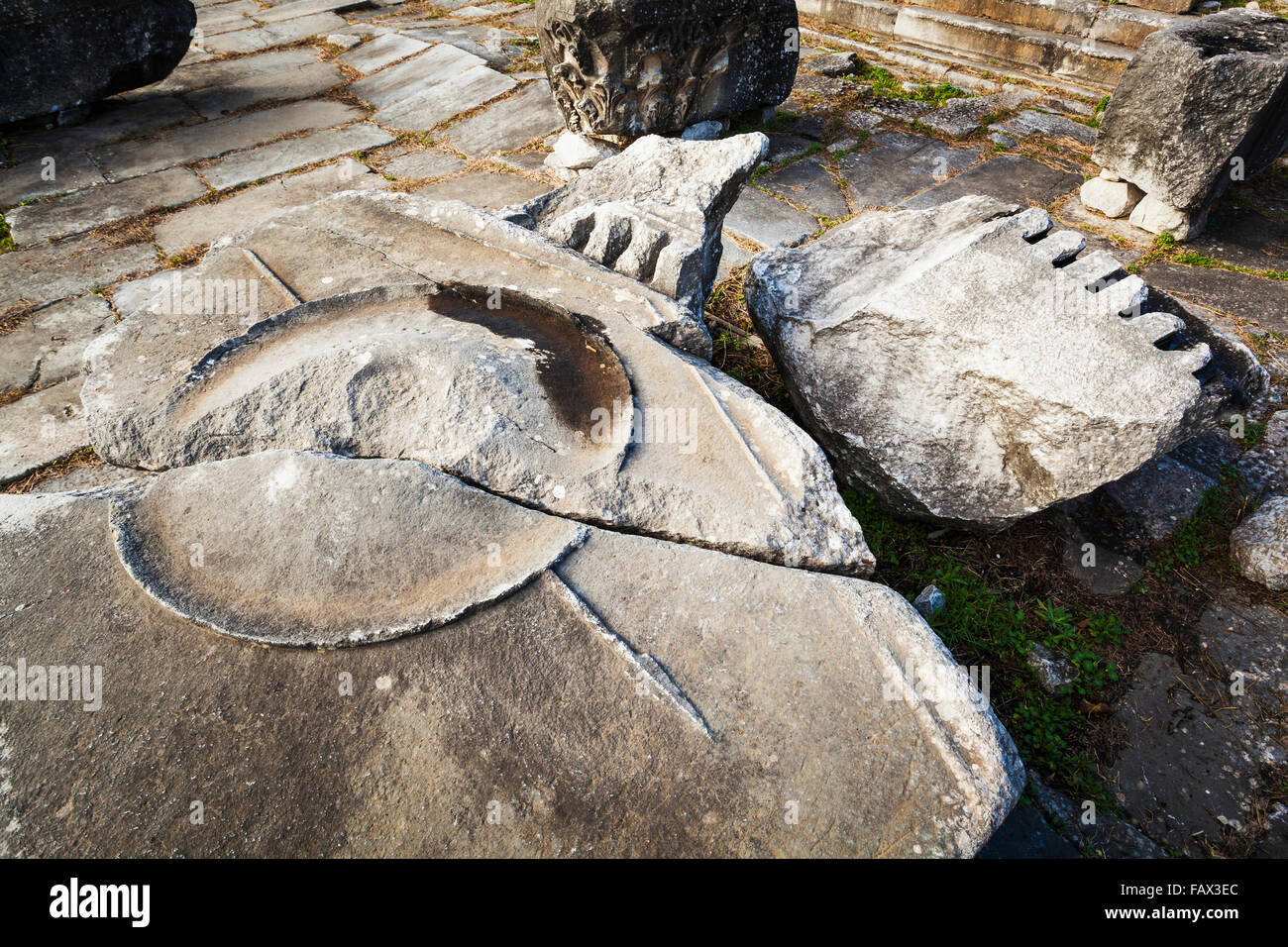 Carved shield and spear in rock with a crack; Philippi, Greece Stock ...