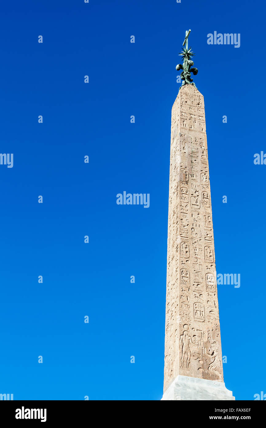 Obelisk with statue on top and etchings on facade; Rome, Italy Stock ...