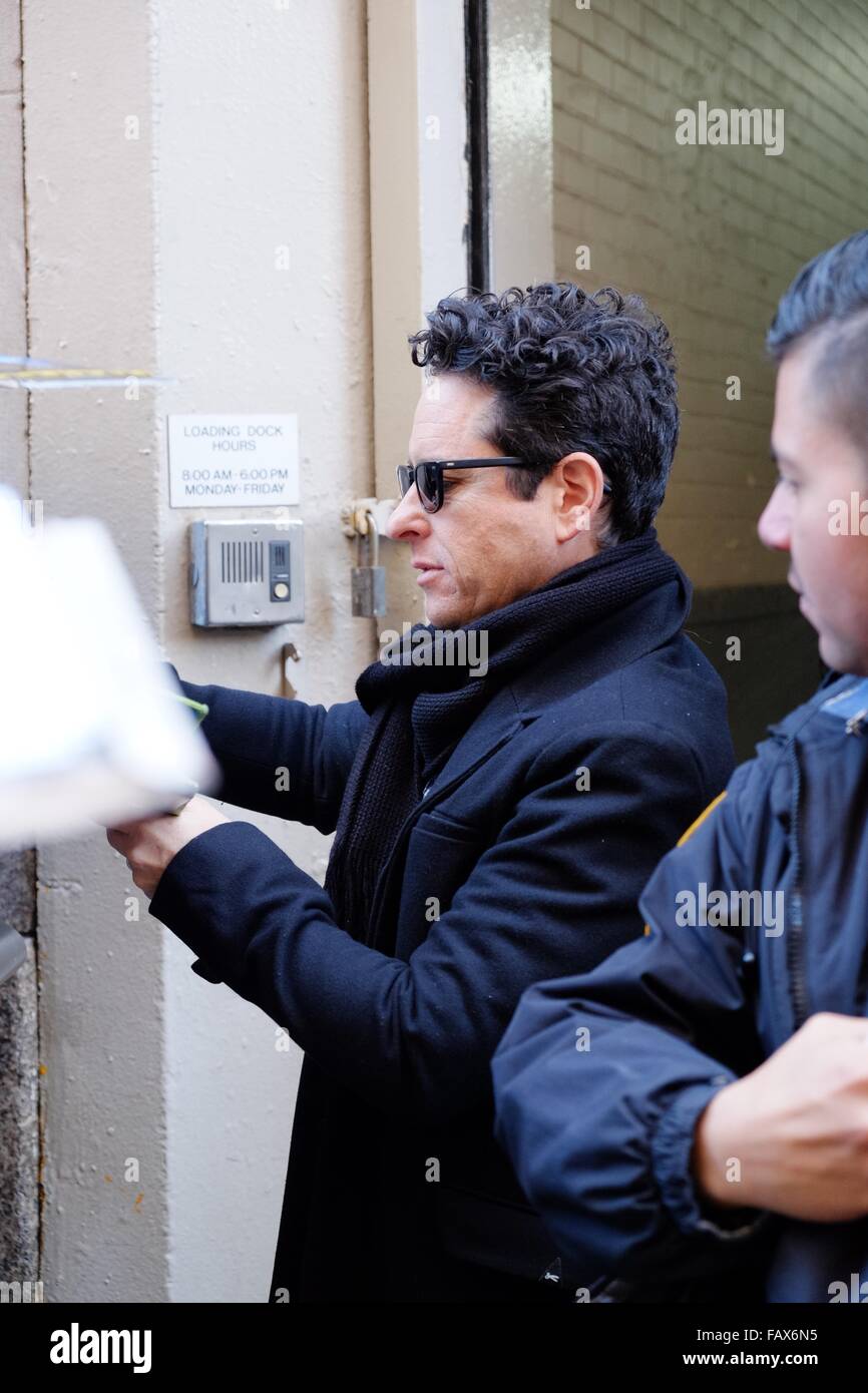 Star Wars director JJ Abrams signs posters for fans outside of ...