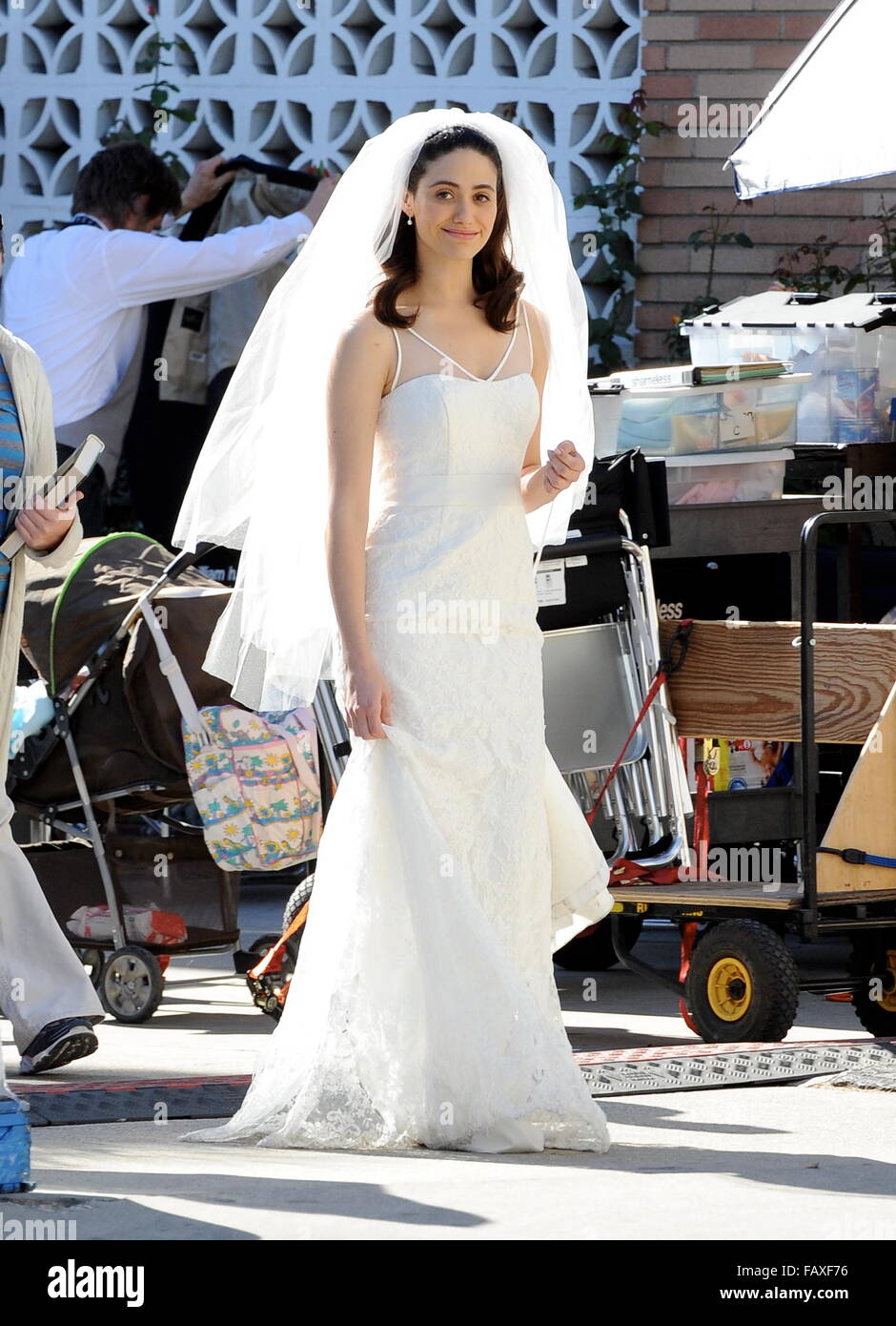 Actress Emmy Rossum looking flawless in a wedding dress as she filming ...