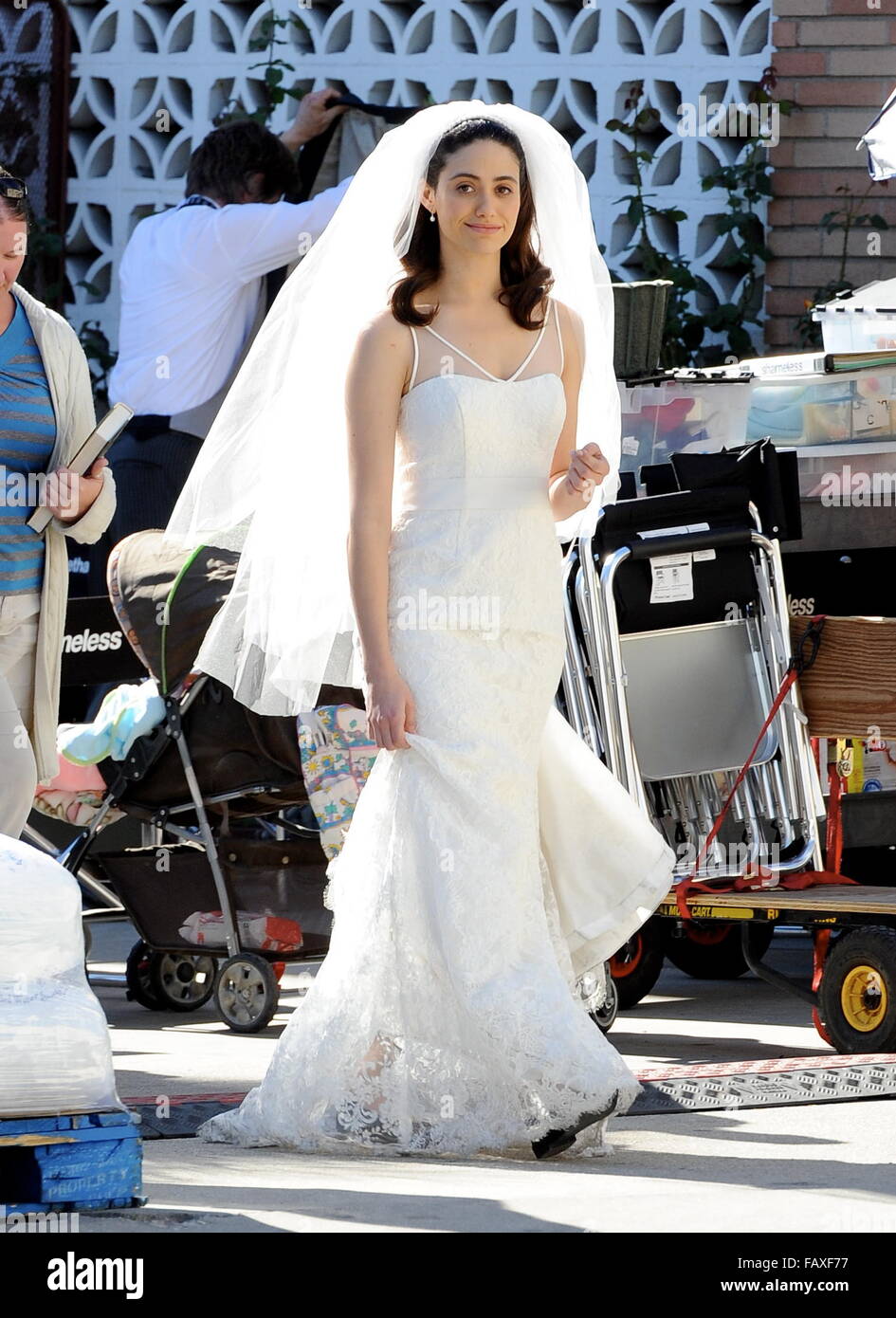 Actress Emmy Rossum looking flawless in a wedding dress as she filming ...