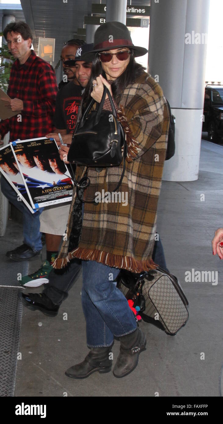 Demi Moore departs on a flight from Los Angeles International Airport ...