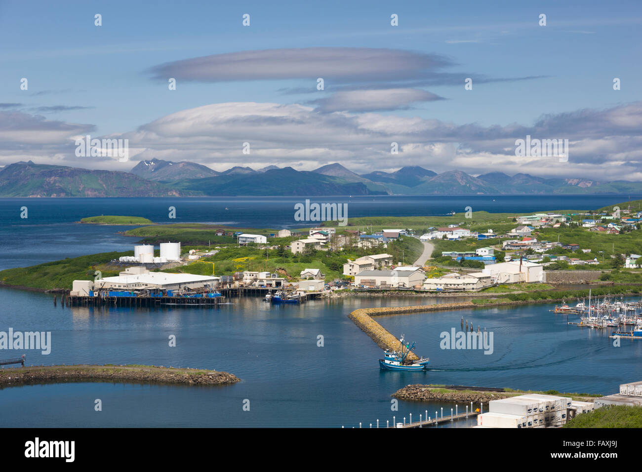 View Sand Point harbor and breakwaters of Popof Island on a sunny day ...