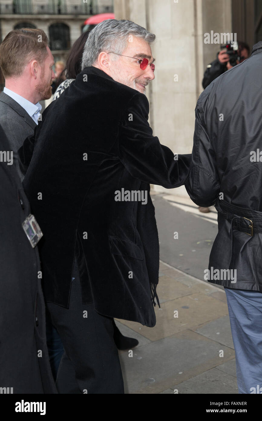 A frail Burt Reynolds pictured being helped by aids, arriving at the ...