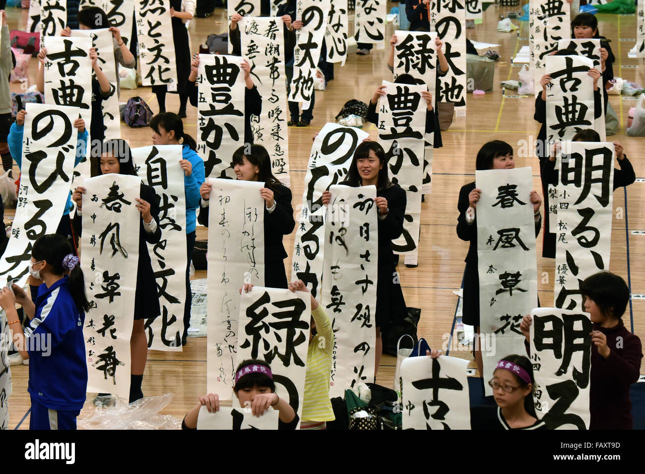 Tokyo, Japan. 5th Jan, 2016. Participants display freshly-inked ...