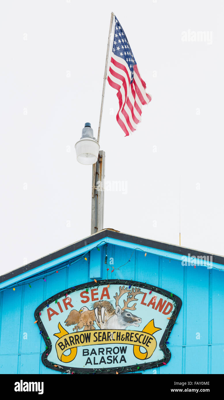 An American Flag flies above the Barrow Search and Rescue Office ...