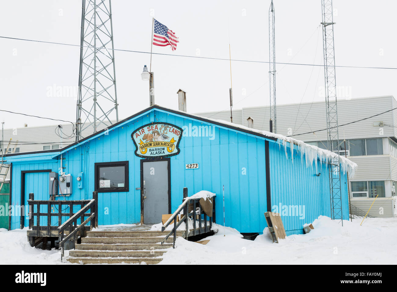 An American flag flies above the Barrow Search and Rescue Office ...