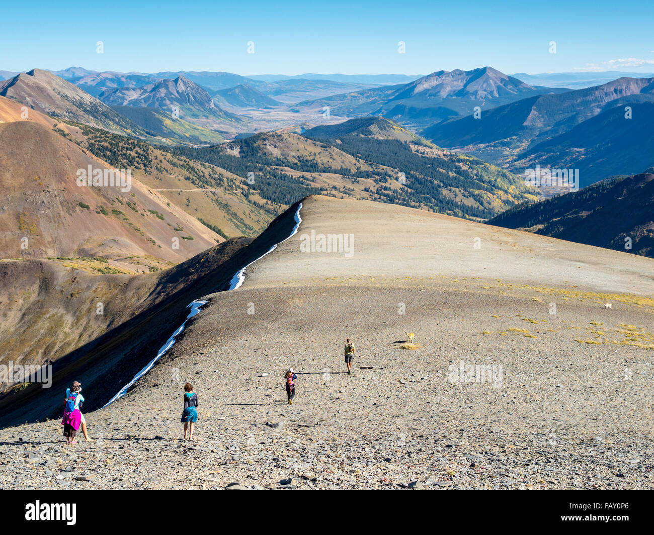 CRESTED BUTTE, COLORADO - SEPTEMBER 20, 2015: Hikers traverse high ...